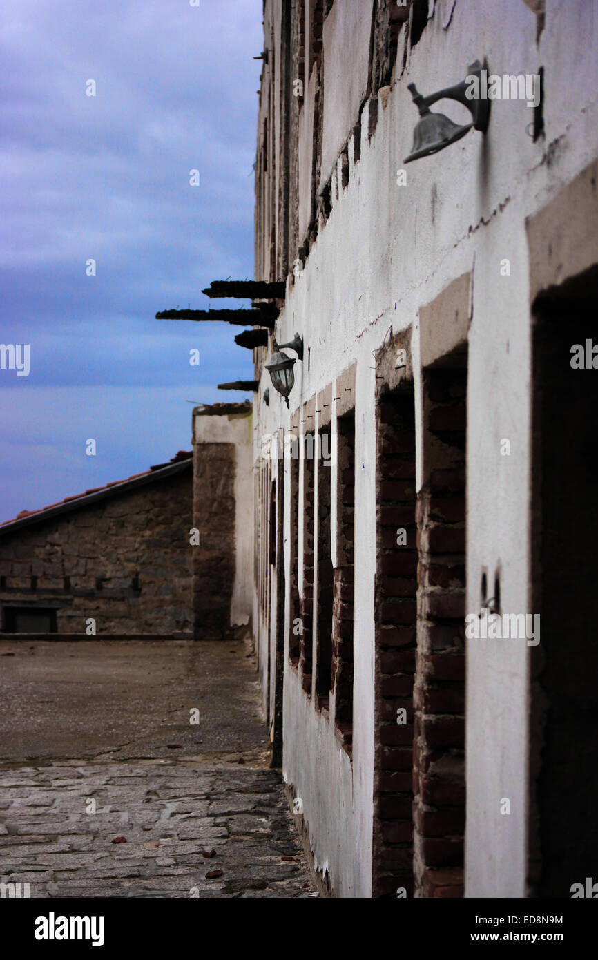 Burnt old building with blue sky Stock Photo - Alamy