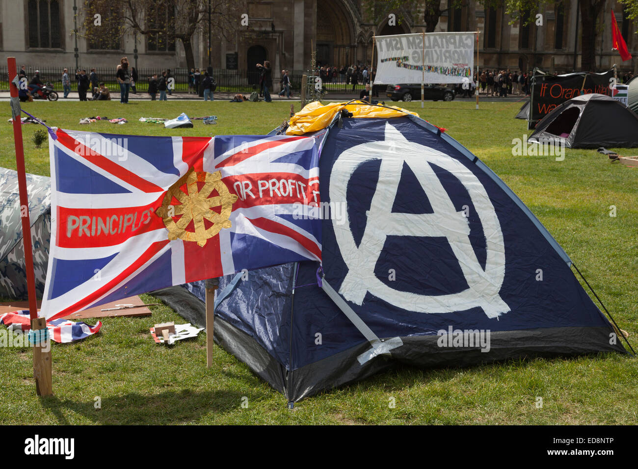 A Union Jack flies next to an anarchist's tent in Parliament Square ...