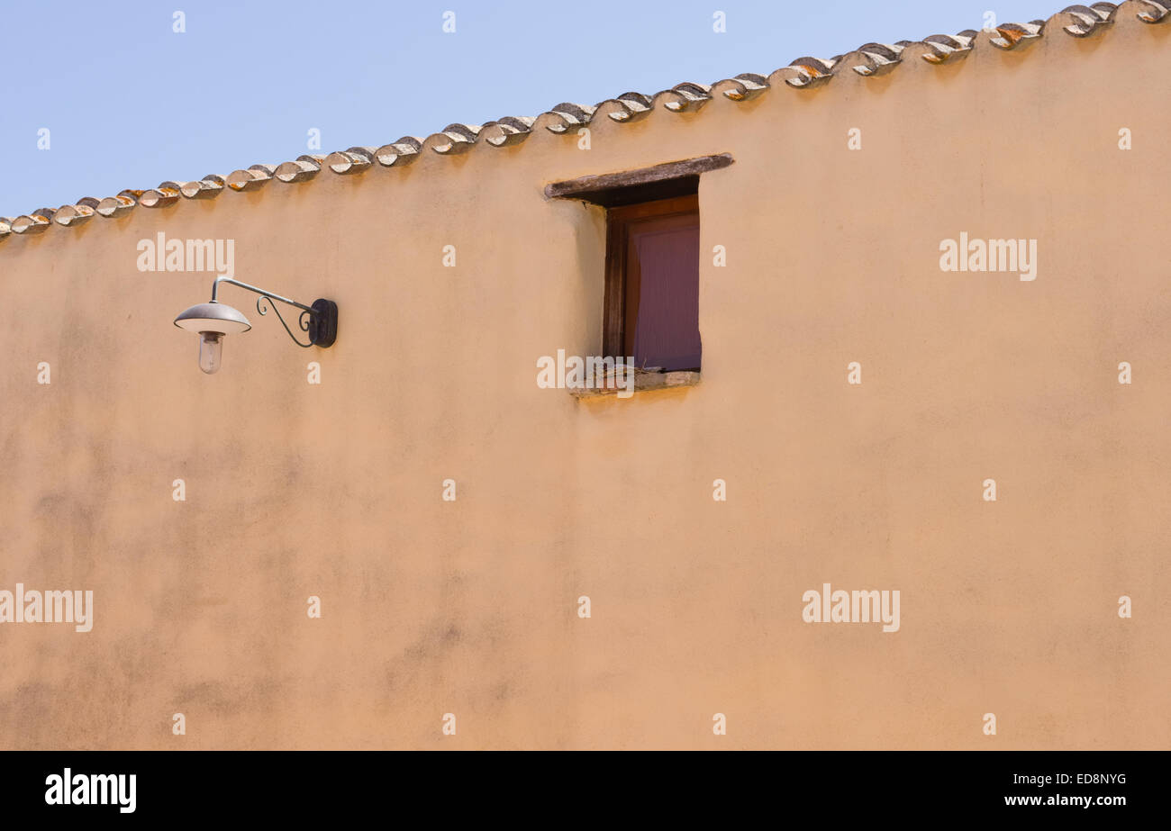 Minimalist wall with window and lamp post Stock Photo - Alamy