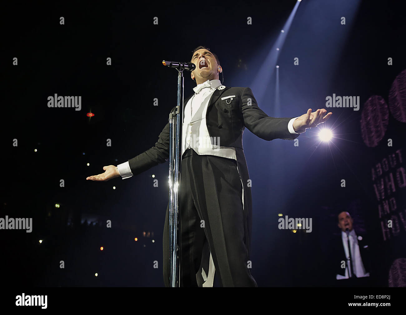 Robbie williams performing live on hi-res stock photography and images ...