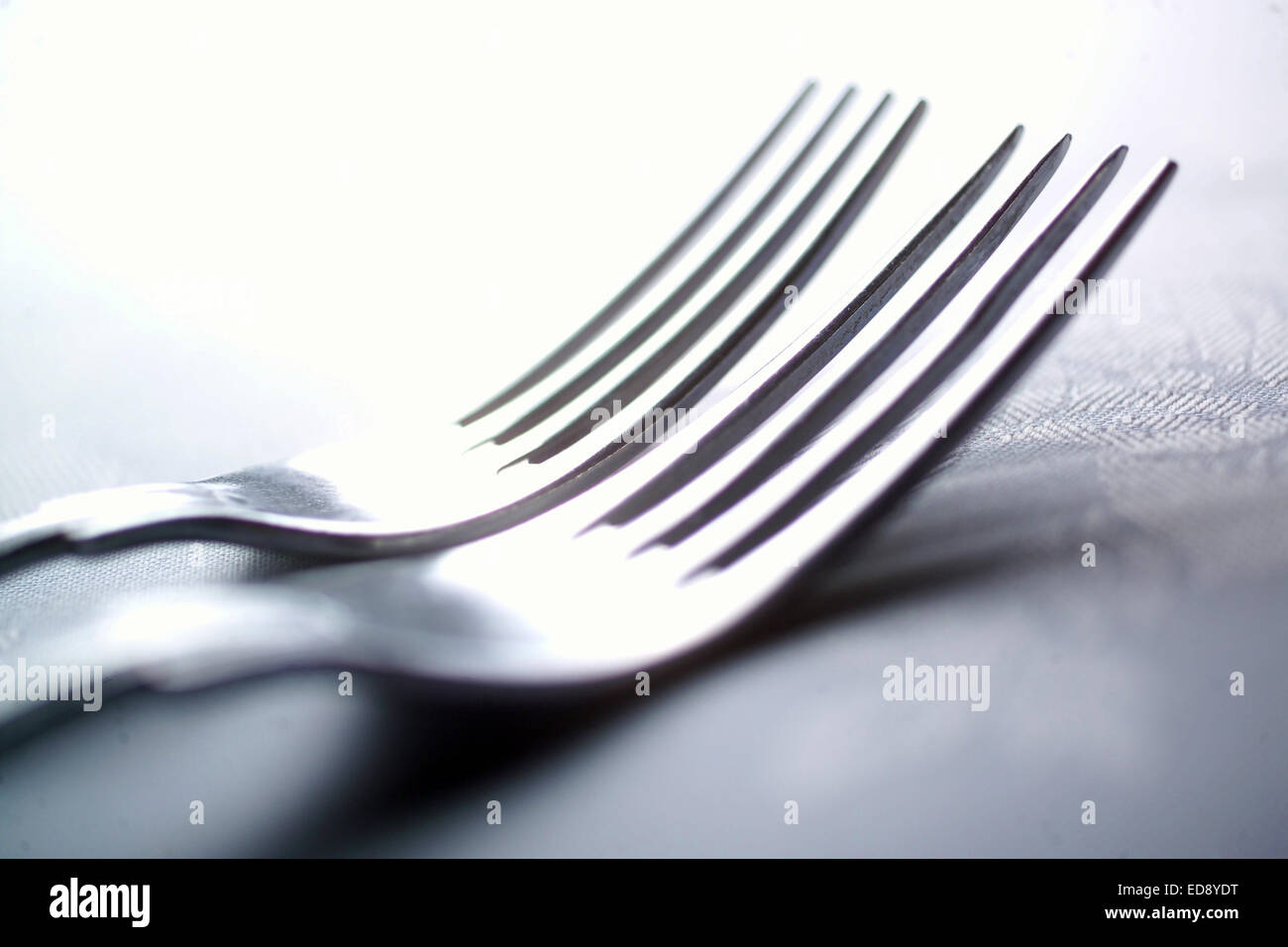 Forks / Table setting in restaurant Stock Photo - Alamy