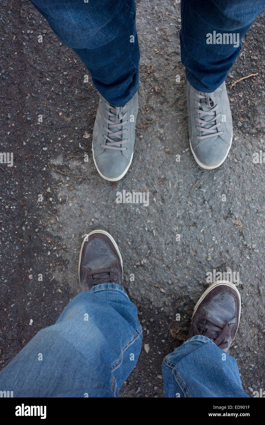 Two people facing hi-res stock photography and images - Alamy