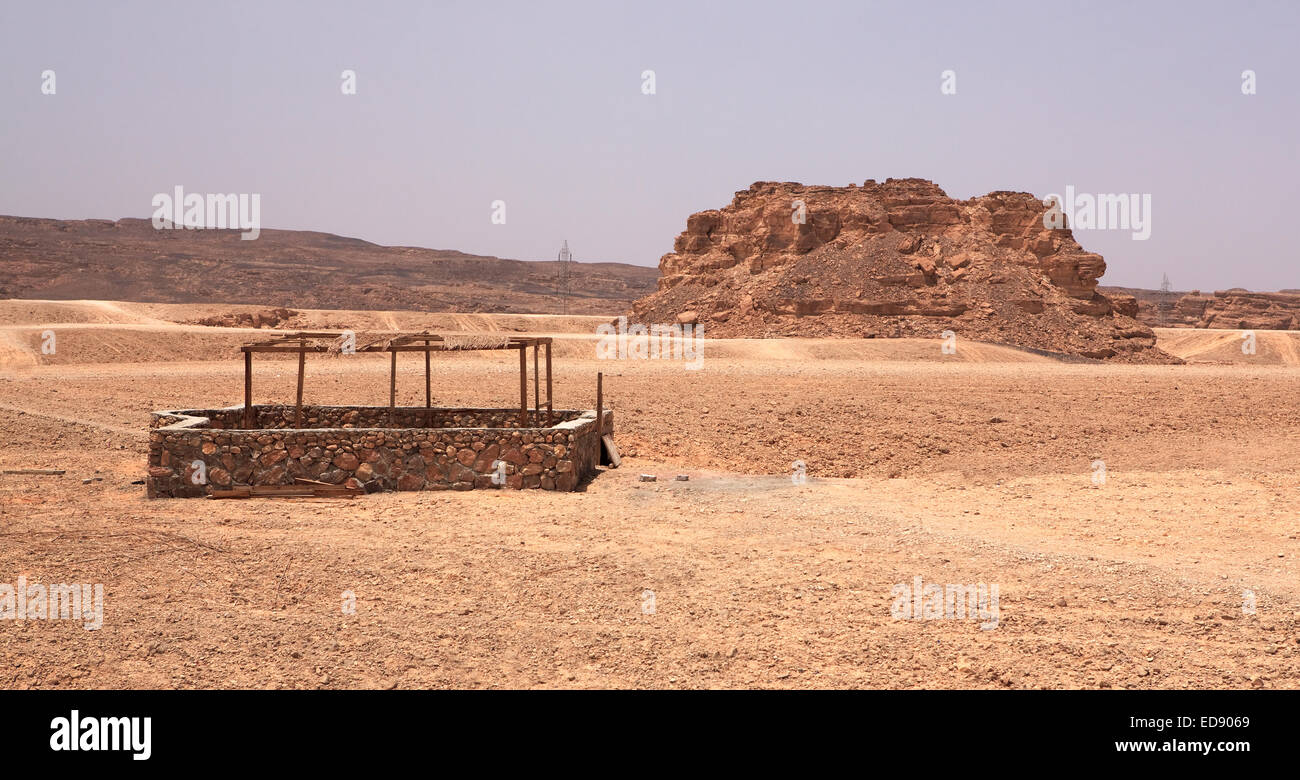 Well in the stone desert Stock Photo - Alamy