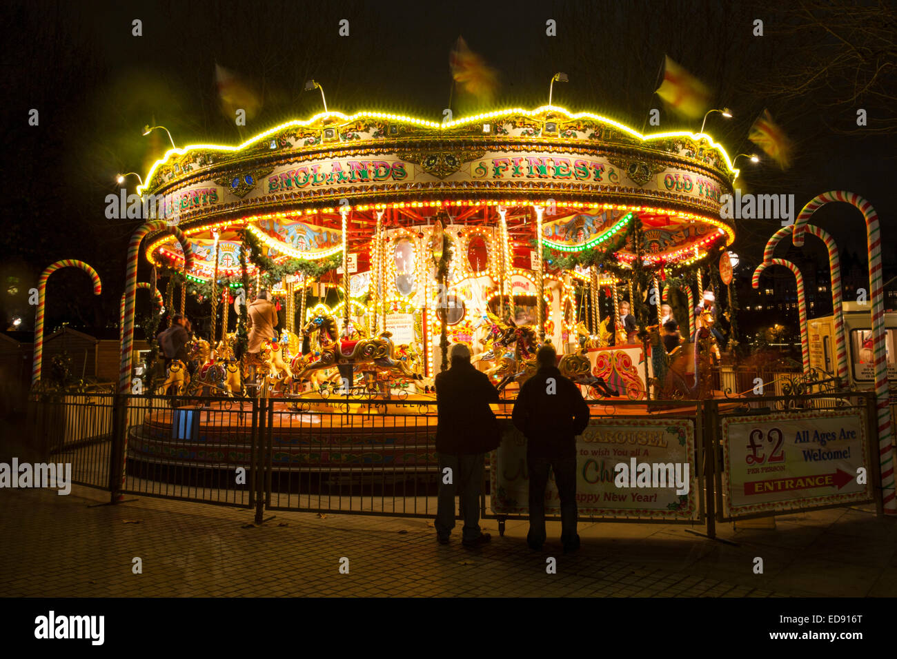 Long exposure of merry go round fairground ride at night at London in ...