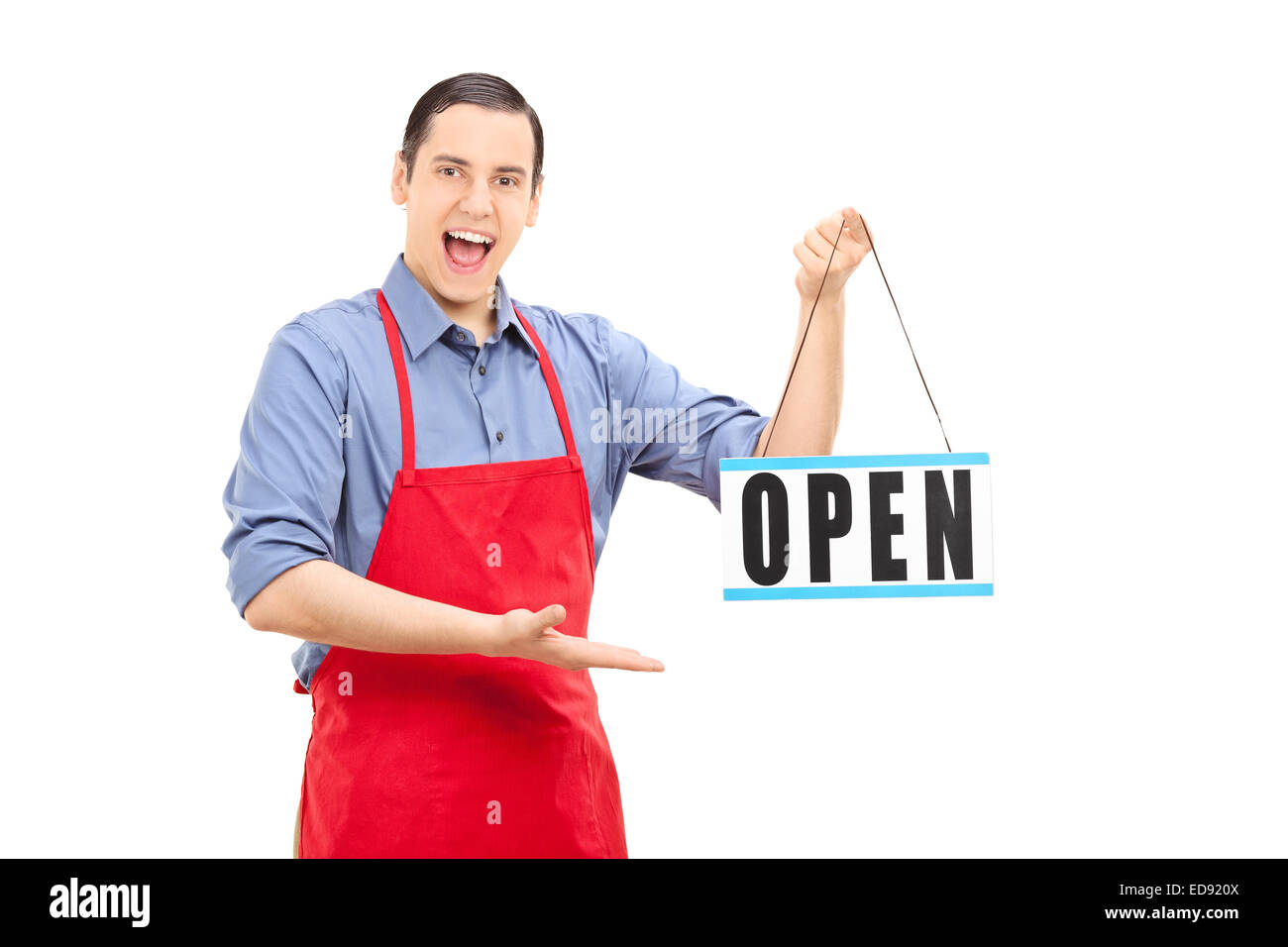 Young retail worker holding an open sign isolated on white background ...