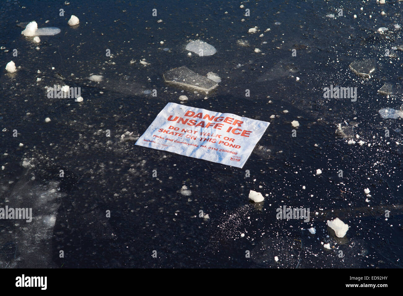 Danger unsafe Ice Notice on frozen pond - Sheffield, England, UK Stock ...