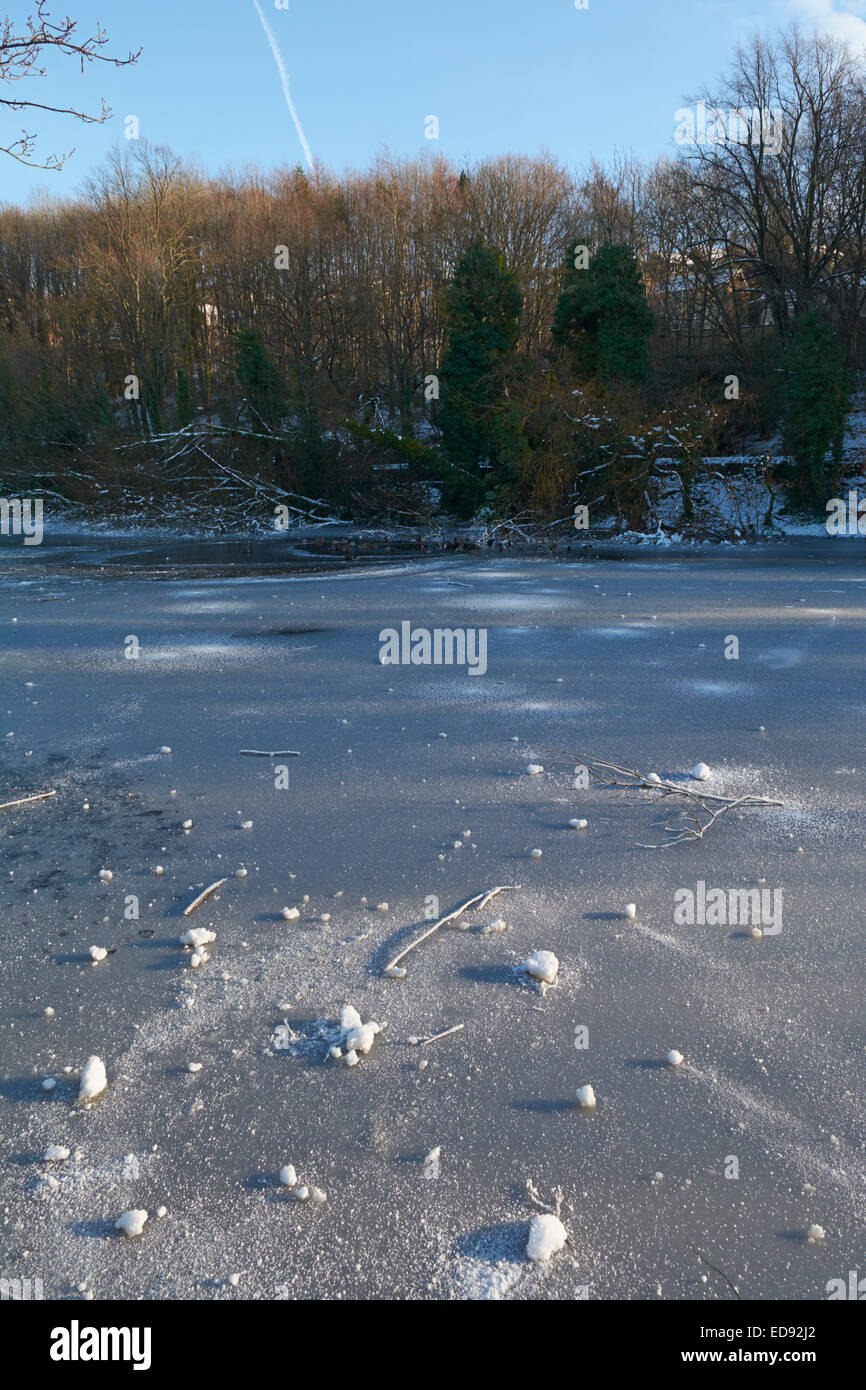 Icy frozen pond in the Rivelin Valley - Sheffield, England, UK Stock ...