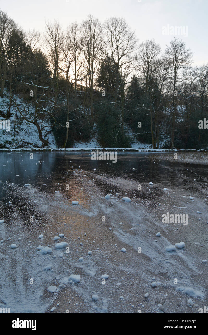 Icy frozen pond in the Rivelin Valley - Sheffield, England, UK Stock ...