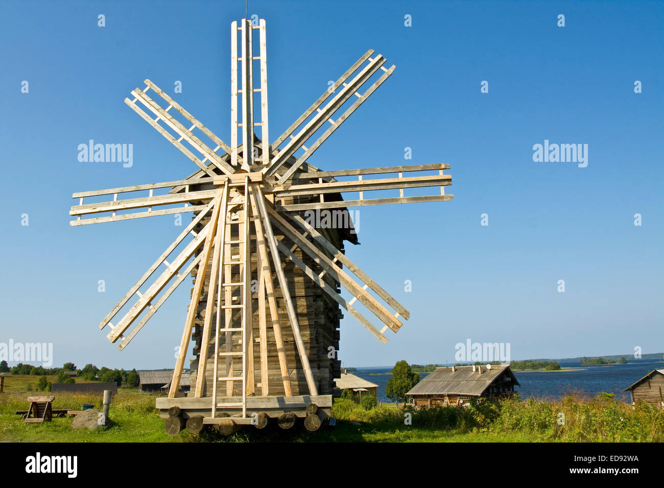 Old wooden windmill and houses on island Kizhi on Onega (Onezhskoye ...
