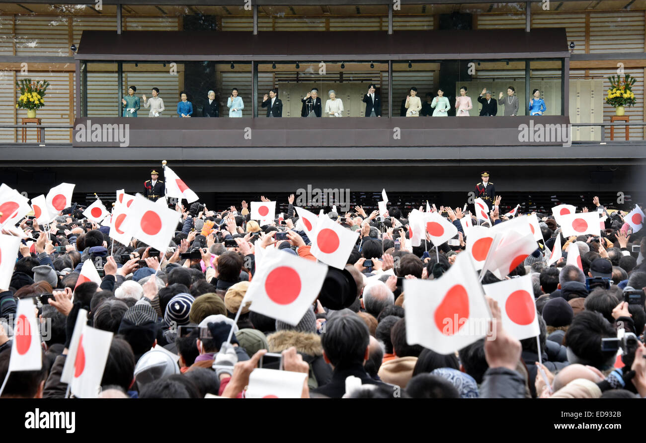 Tokyo, Japan. 2nd Jan, 2015. Emperor Akihito and Empress Michiko wave ...