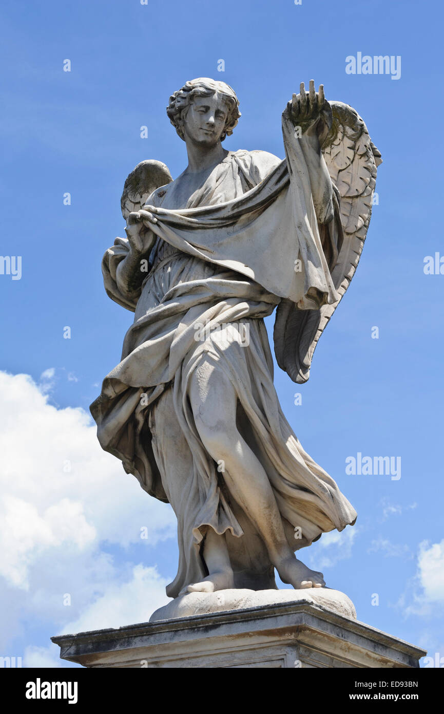 An Angel sculpture against a blue sky with the Sudarium from St Angelo ...