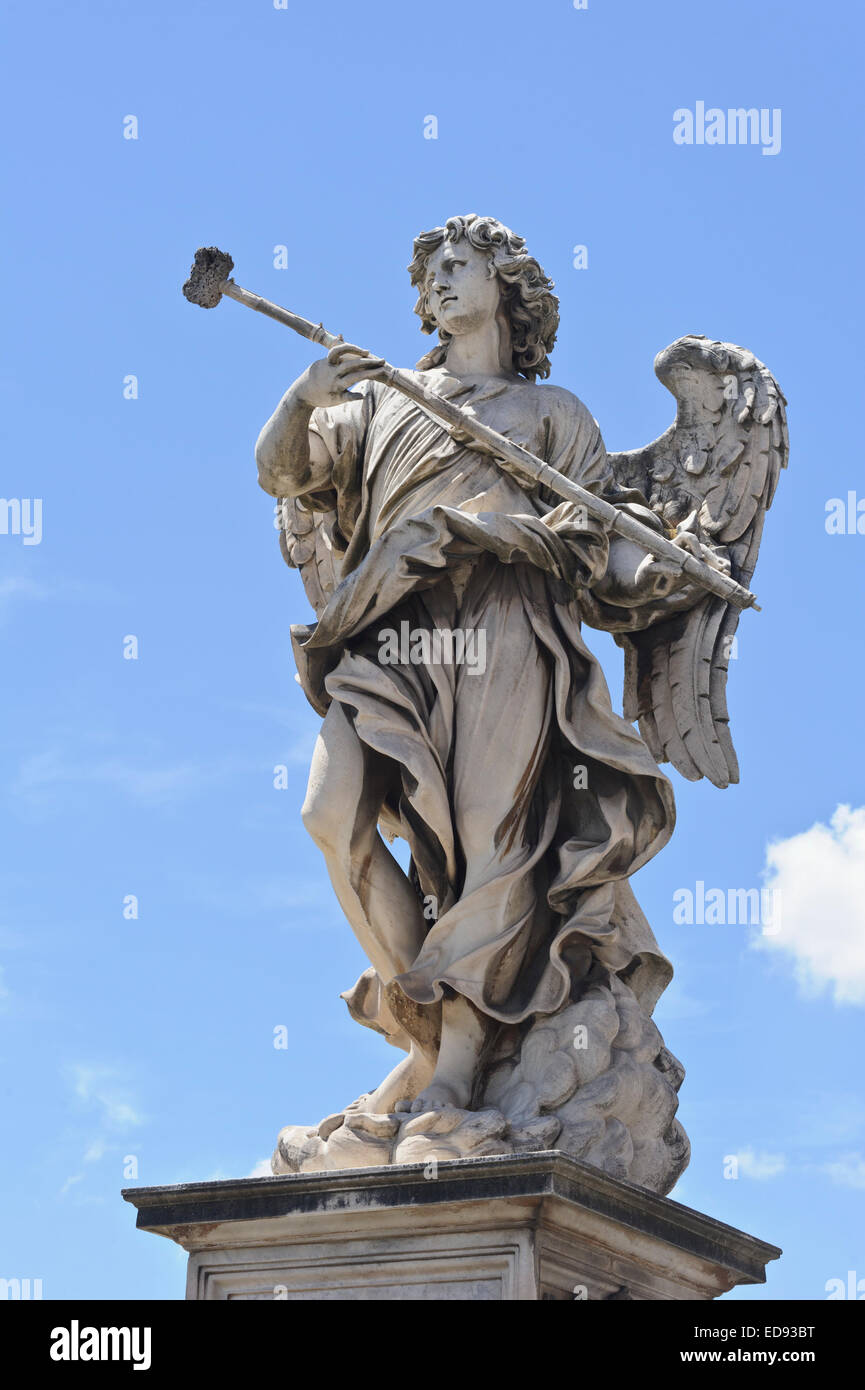 An Angel sculpture with a rod and sponge with vinager against a blue ...