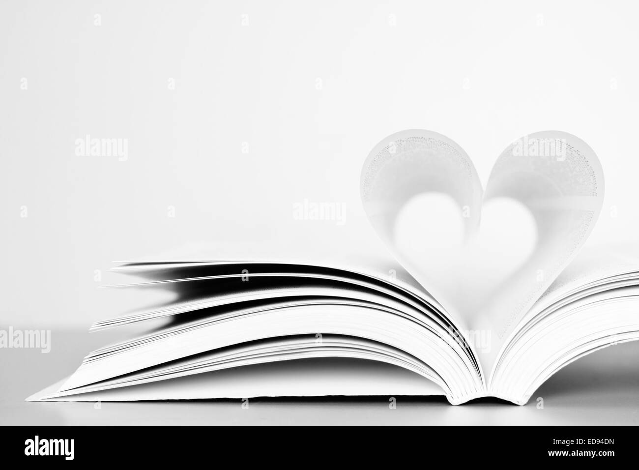 Reading romantic fiction Black and White Stock Photos & Images - Alamy