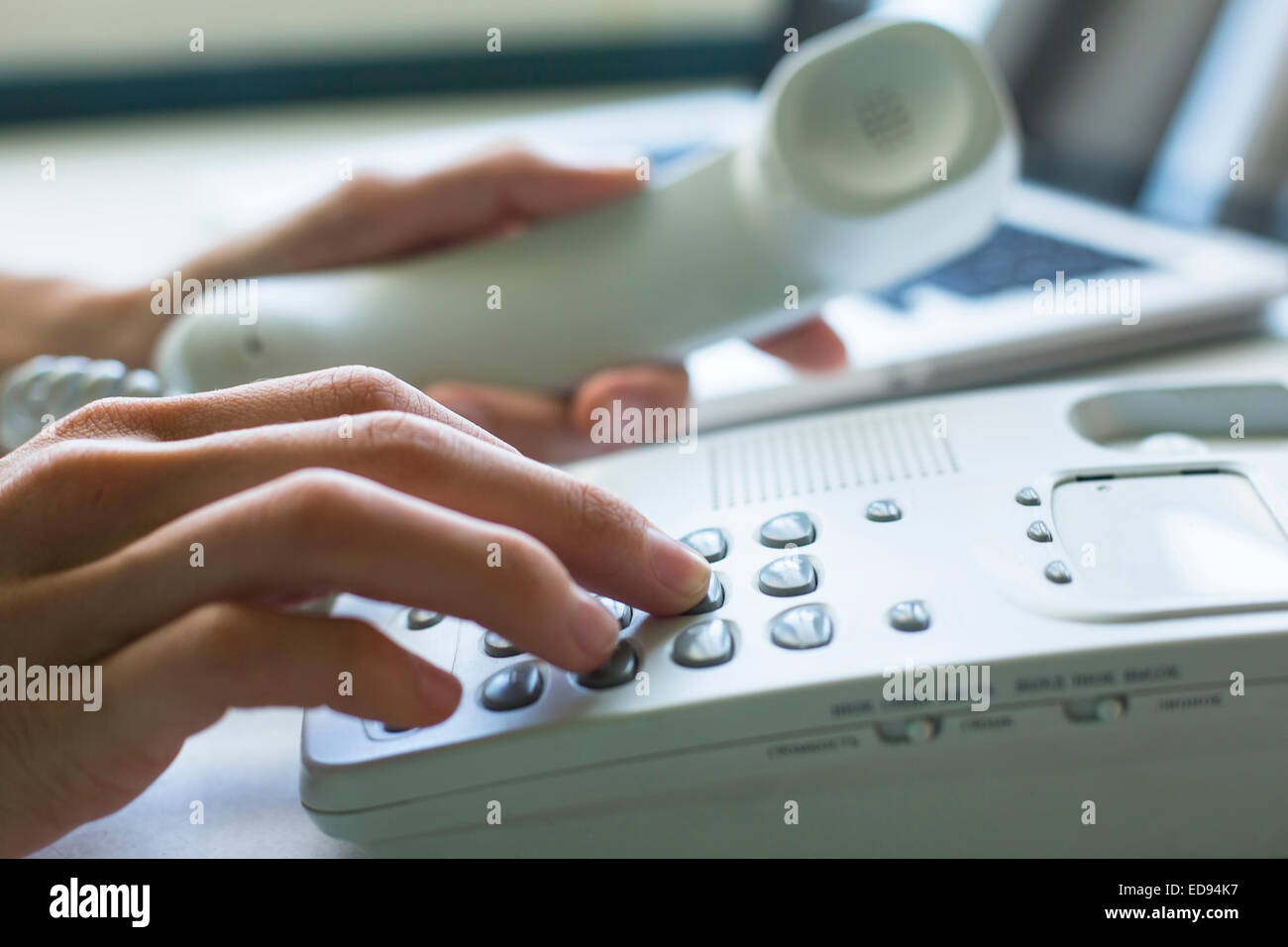 Female hands using phone Stock Photo - Alamy