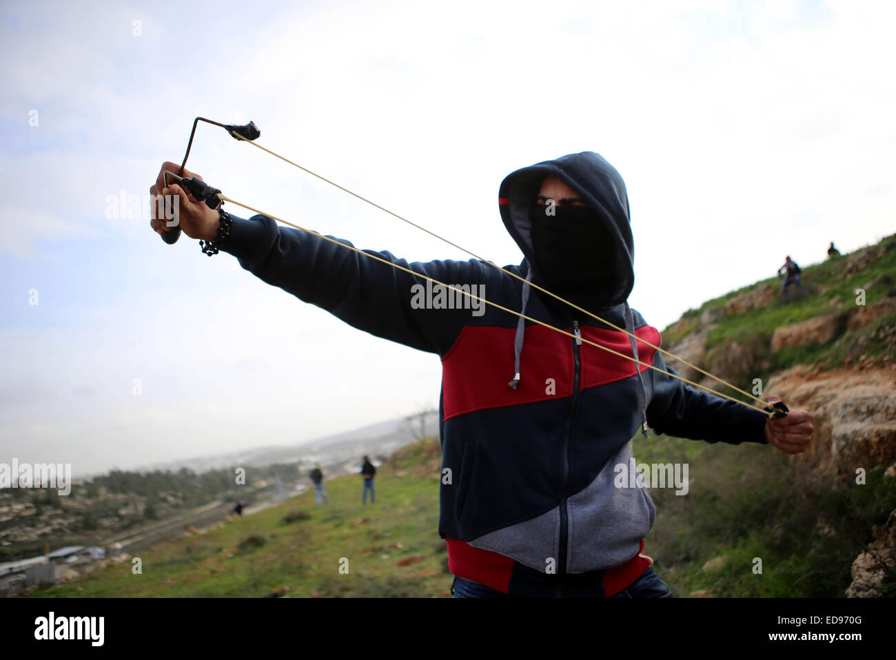 Palestinian with sling shot hi-res stock photography and images - Alamy