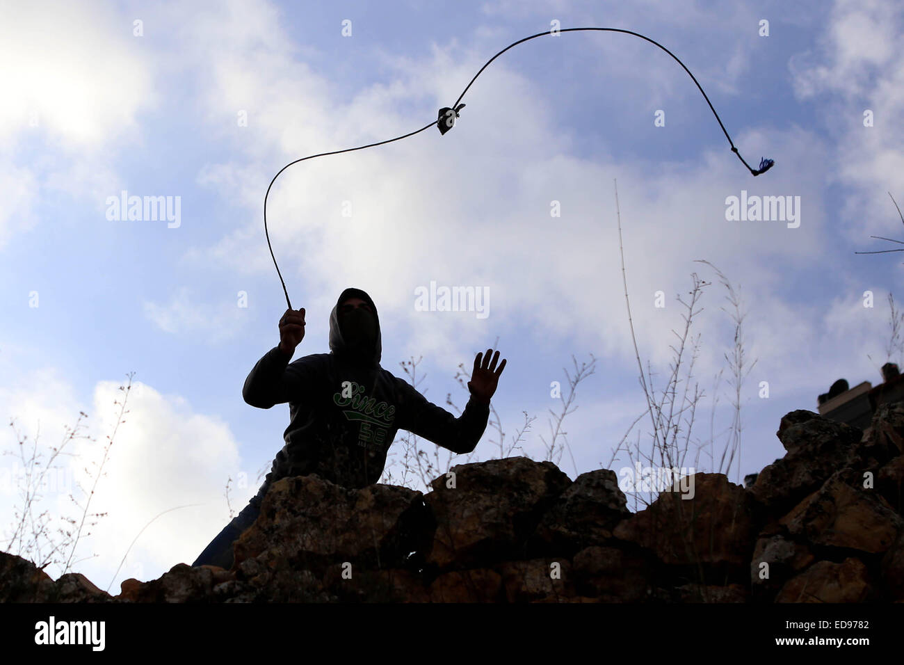 Palestinian with sling shot hi-res stock photography and images - Alamy