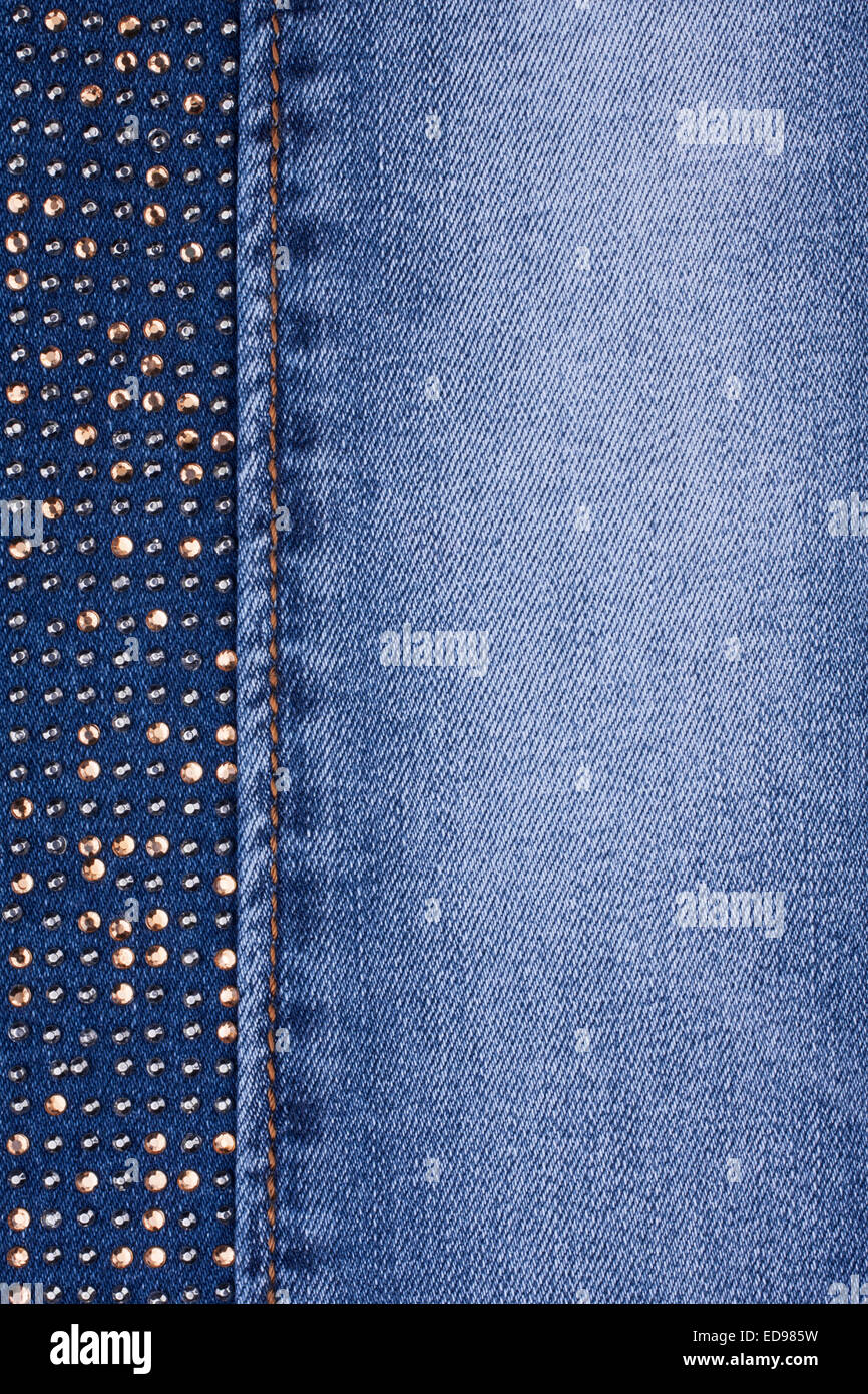 Yellow rhinestones and yellow seam on denim, background, texture Stock ...