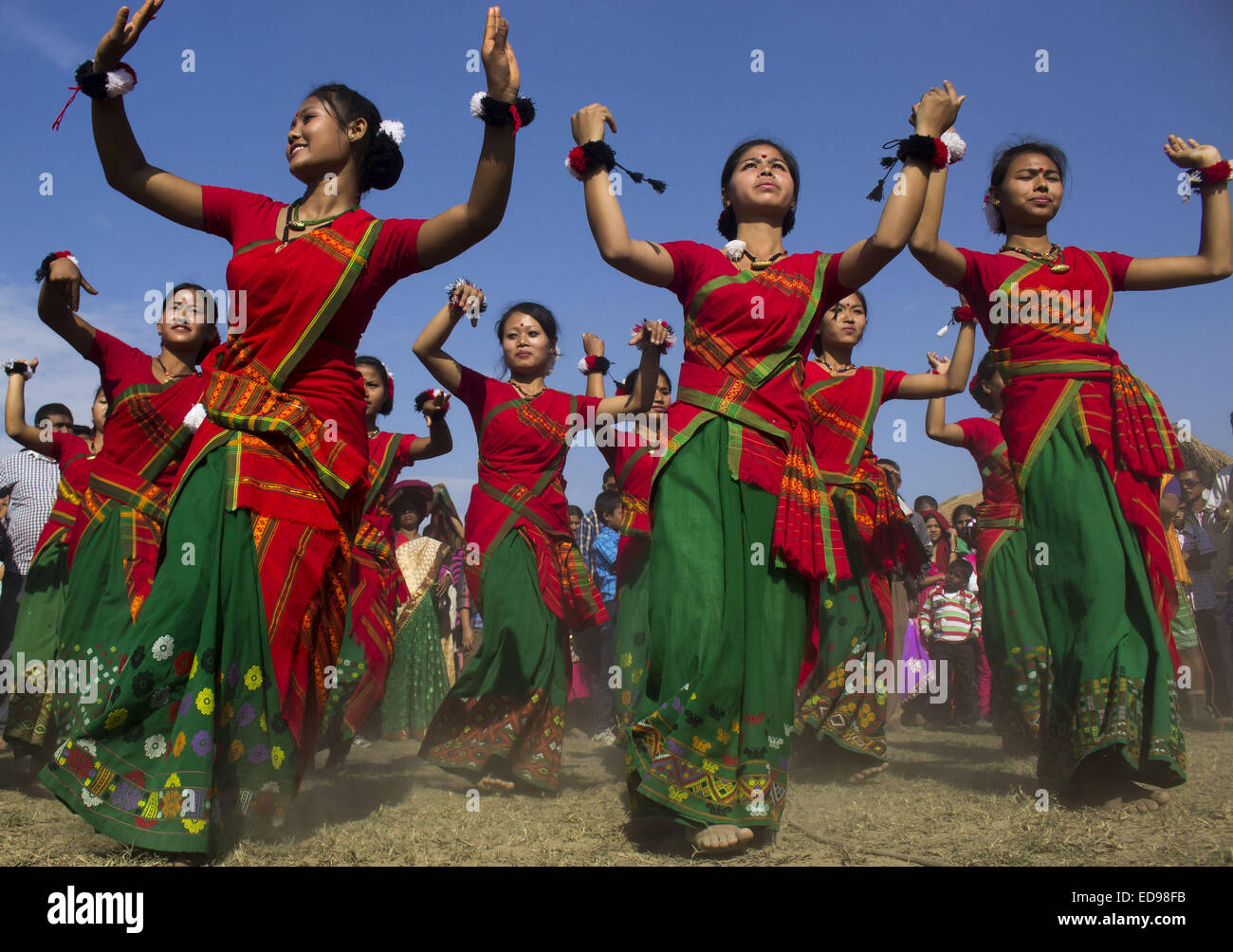Sivasagar, Assam, India. 2nd Jan, 2015. Mishing tribal girls dance during the opening ceremony ...