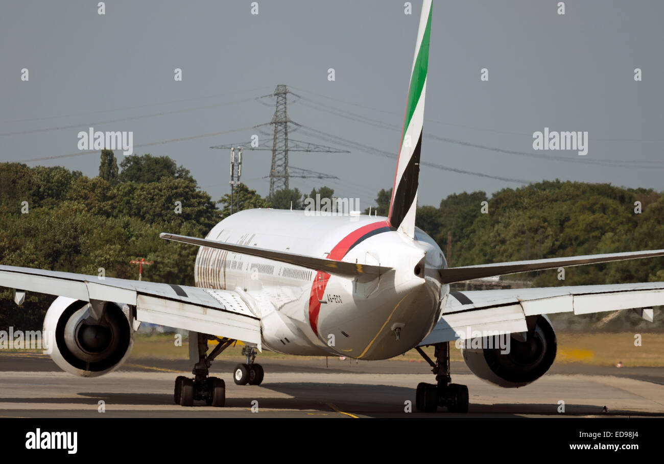 Emirates Boeing 777 taxiing to runway, Dusseldorf International airport ...