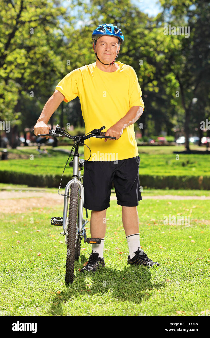 Man standing pose with cycle hi-res stock photography and images - Alamy