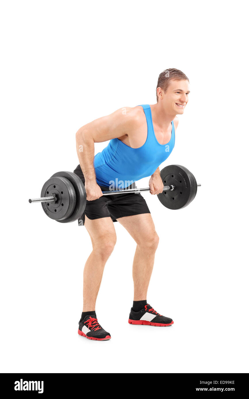 Full length portrait of a muscular bodybuilder lifting a weight ...