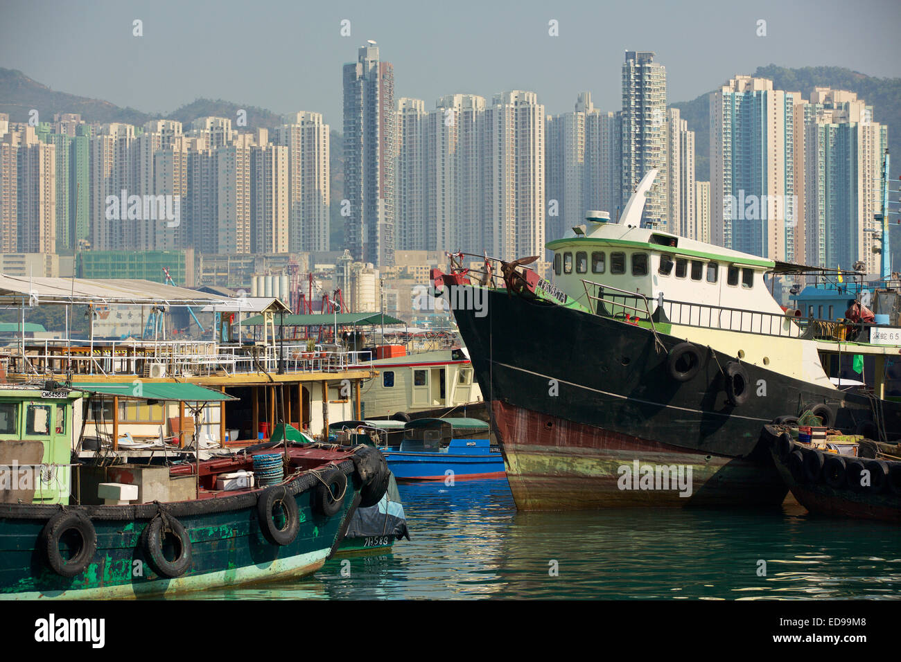 Crowded bay. Collection of assorted boats crammed into a small space ...