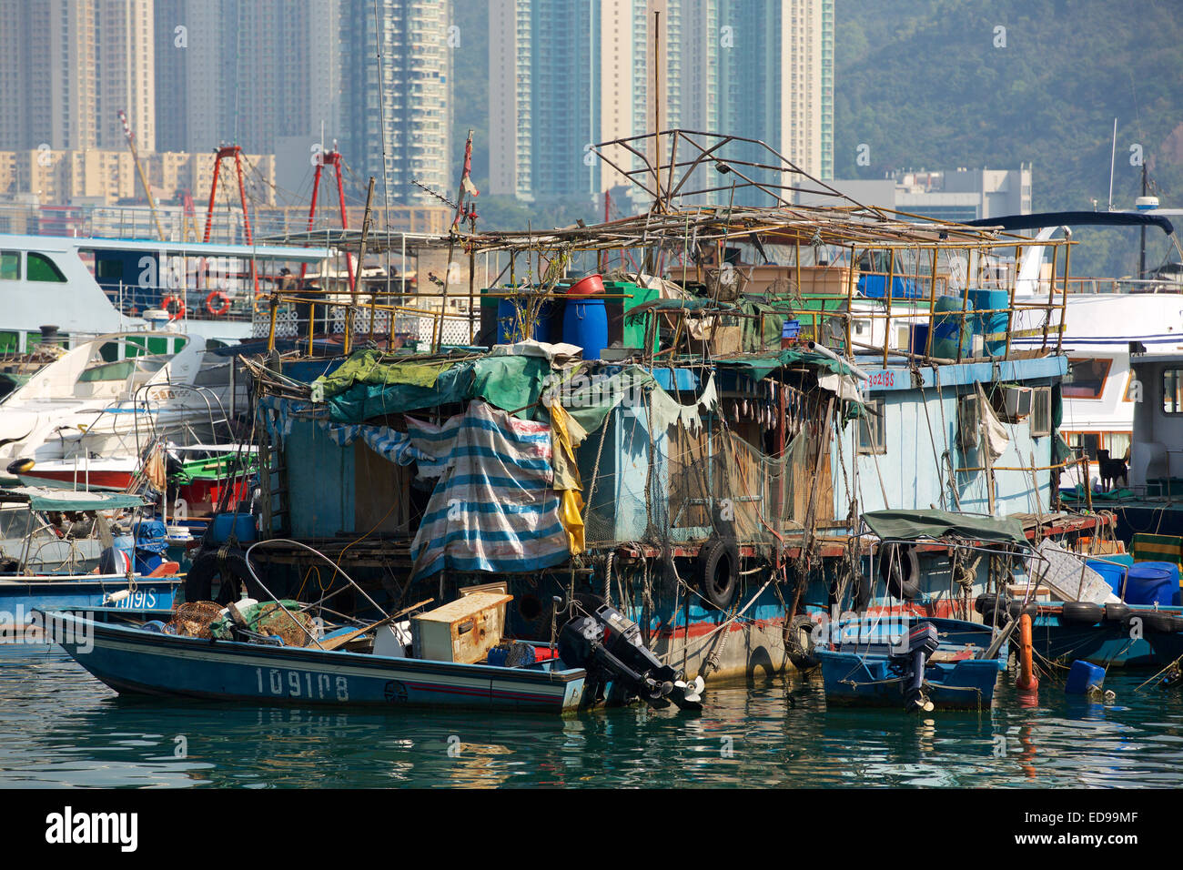 Crowded bay. Collection of assorted boats crammed into a small space ...