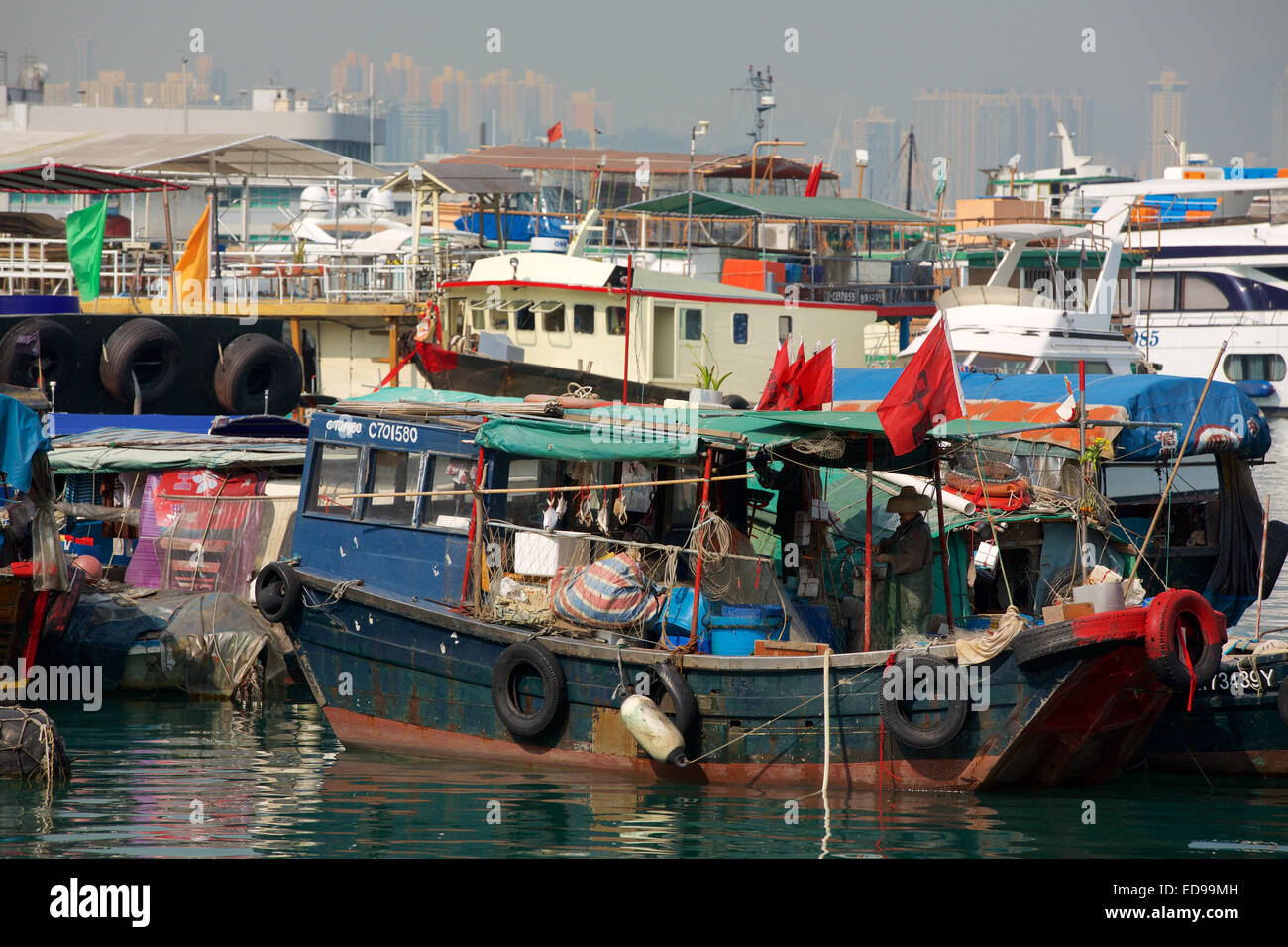 Hong Kong HK Harbor a crowded water way with a collection of assorted ...