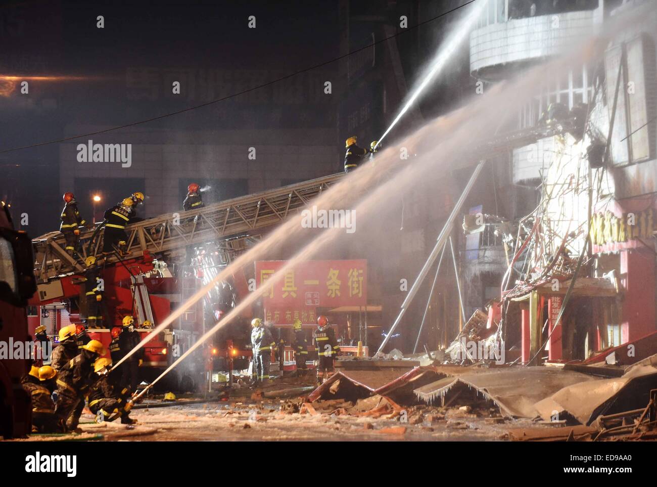 Harbin, China's Heilongjiang Province. 2nd Jan, 2015. Rescuers work on ...