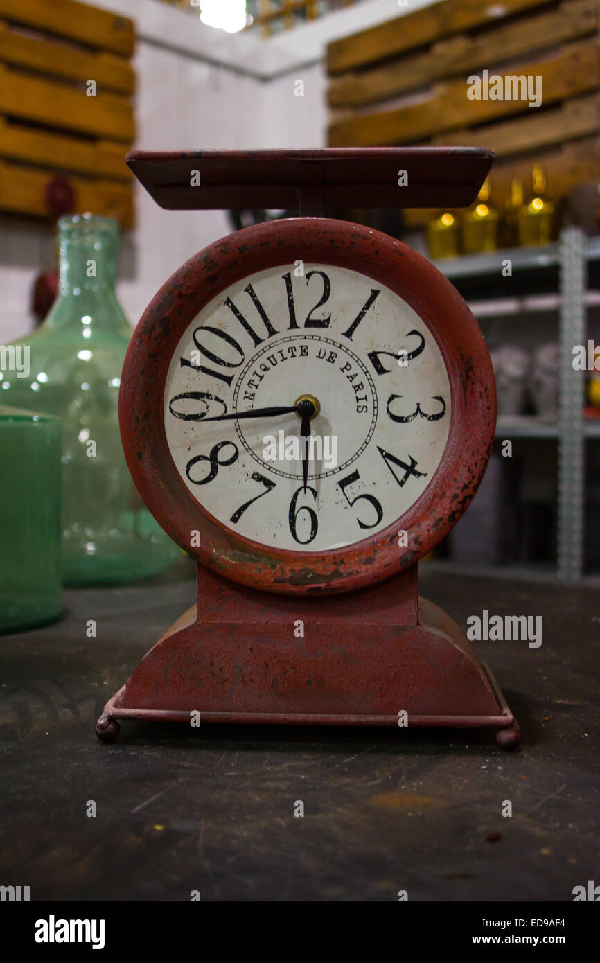 An antique scale clock Stock Photo - Alamy