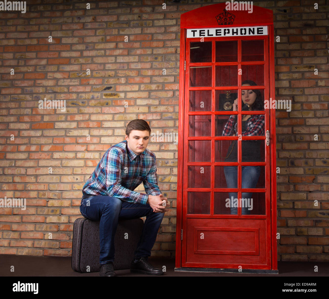 Young man sitting in booth hi-res stock photography and images - Alamy