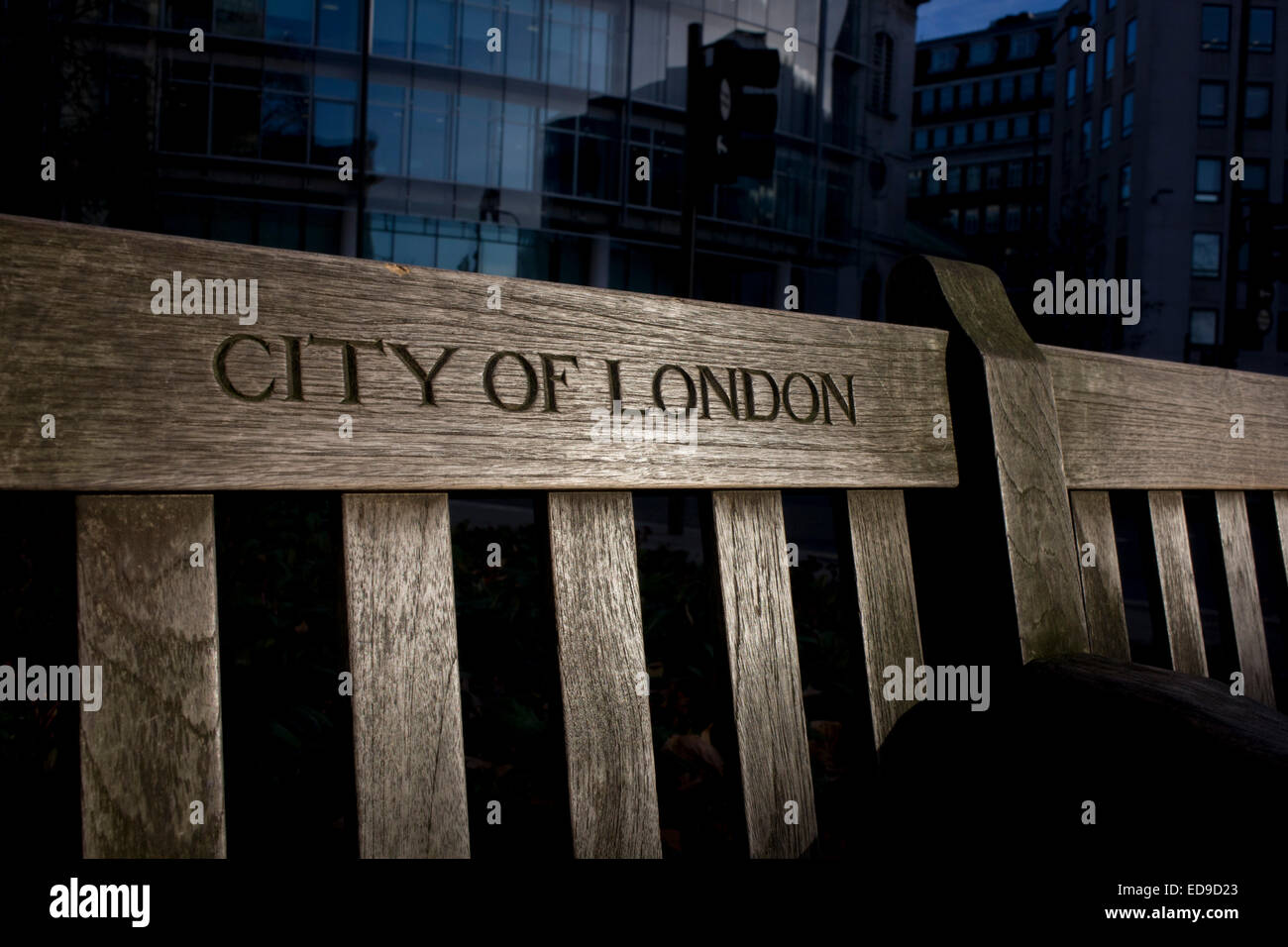 City of London bench and modern city background Stock Photo - Alamy
