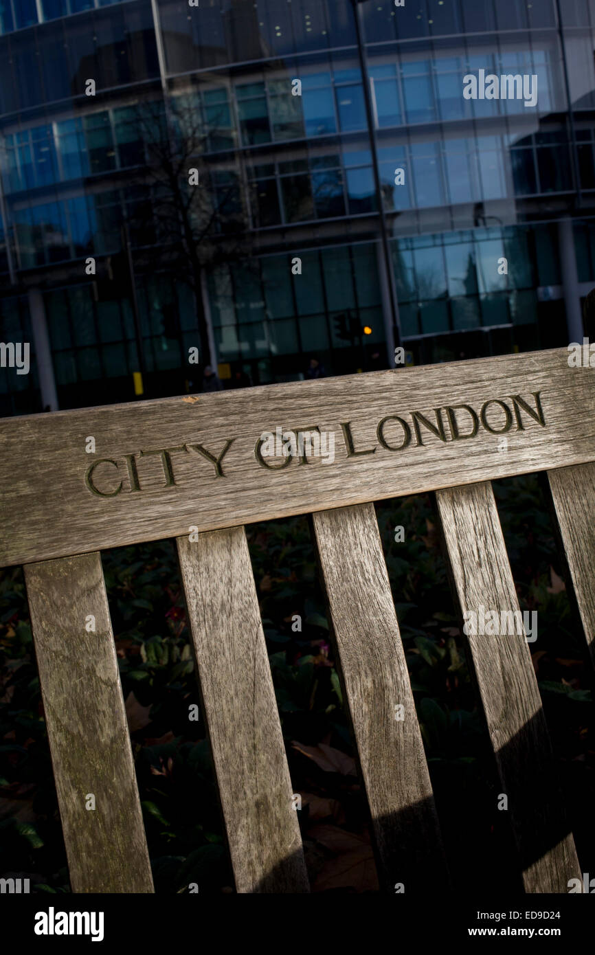City of London bench and modern city background Stock Photo - Alamy