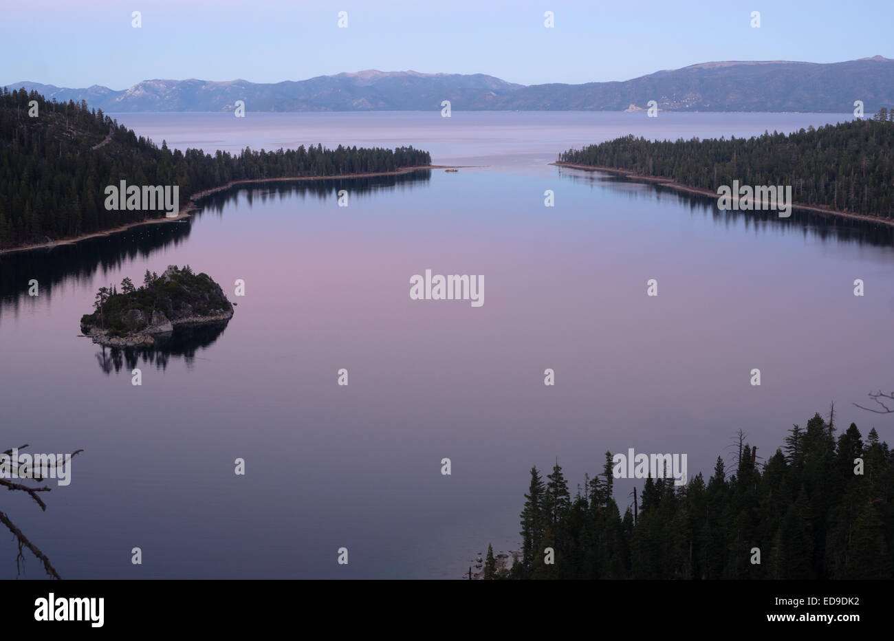 The sun has set leaving purple mutted hues on Emerald Bay Stock Photo ...