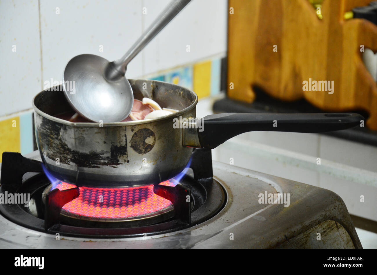 Cooking Octopus and Squid boiled Stock Photo - Alamy