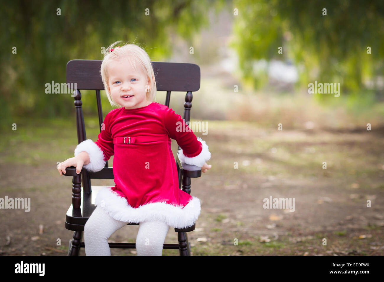 Girl sitting in rocking chair hi-res stock photography and images - Alamy