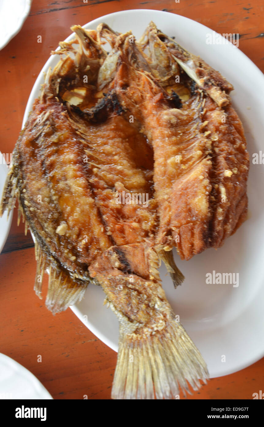Deep Fried Snapper topped with Sweet Fish Sauce Stock Photo - Alamy