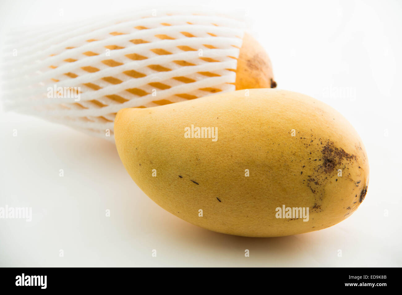 A Mango fruit isolated on white background Stock Photo - Alamy