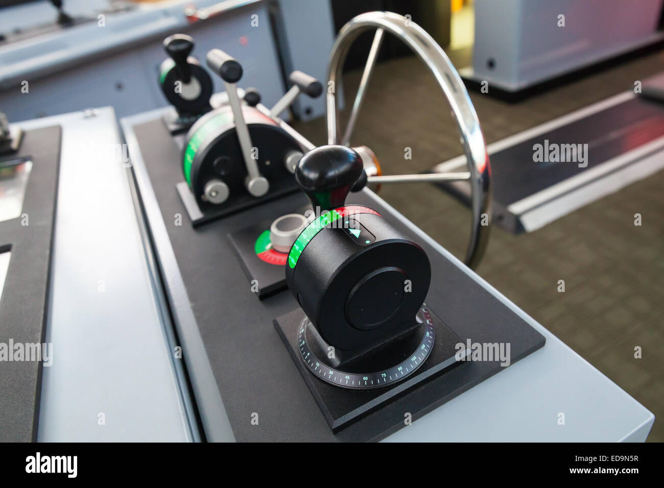 Modern ship control panel with steering wheel on the captains bridge ...
