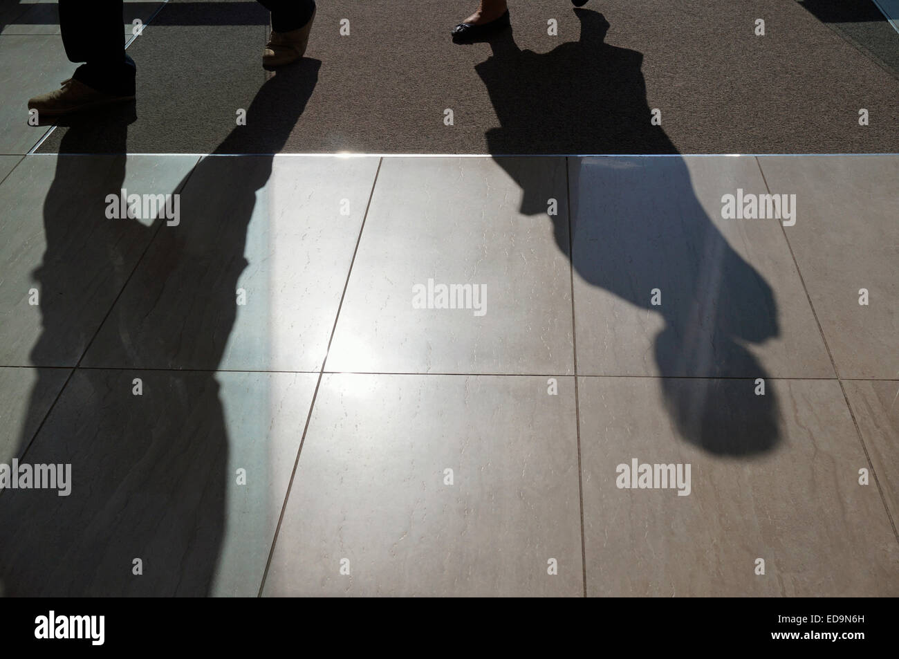 Silhouette shadow figure ground indoor indoors two people hi-res stock ...