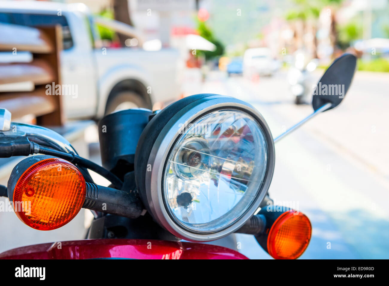 Headlight red motorcycle shot close-up on the street Stock Photo - Alamy