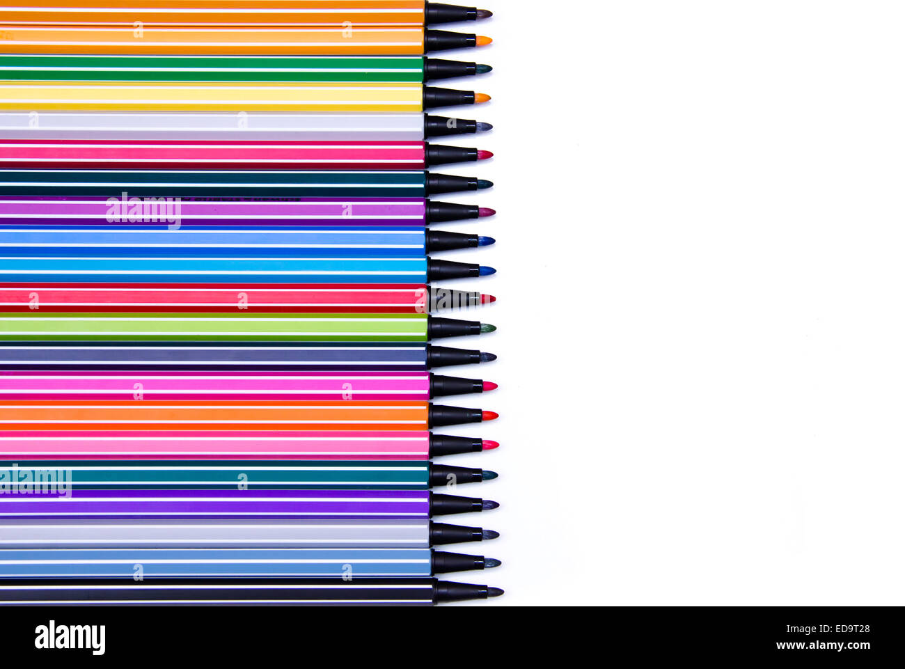 Marker pens ink in a row on white background Stock Photo - Alamy