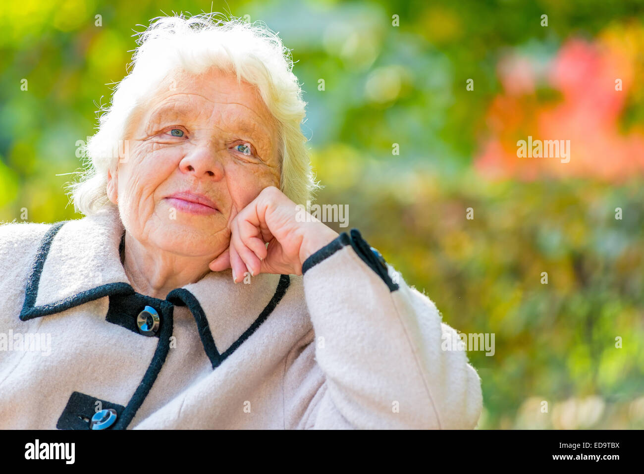 Horizontal portrait of a beautiful pensioner on nature background Stock ...