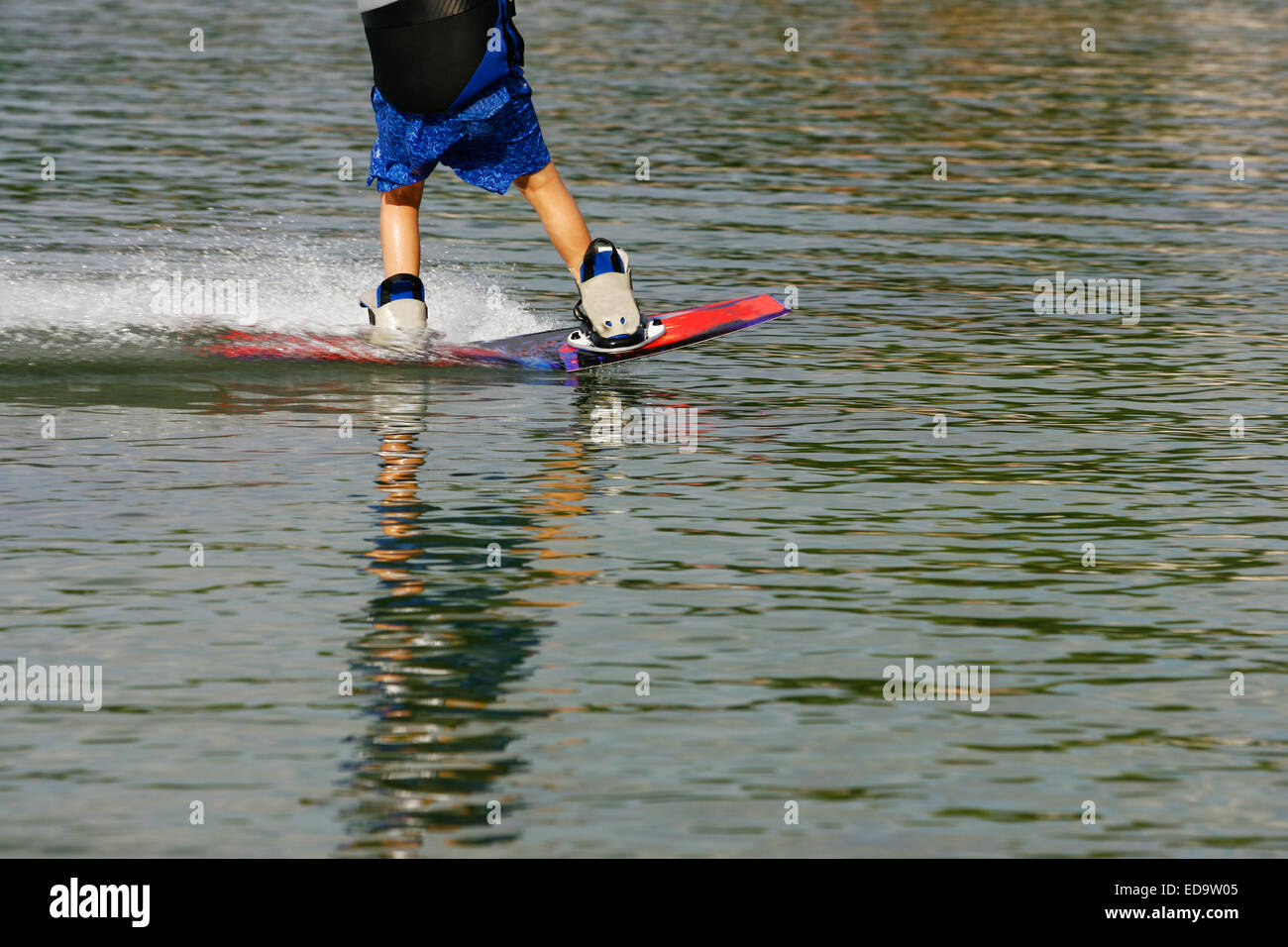 A Water Skier in performance Water Skiing sport on a Lake Stock Photo ...
