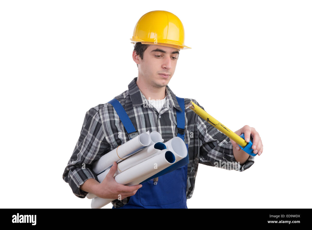 a worker measuring with a tape measure on the white background Stock ...