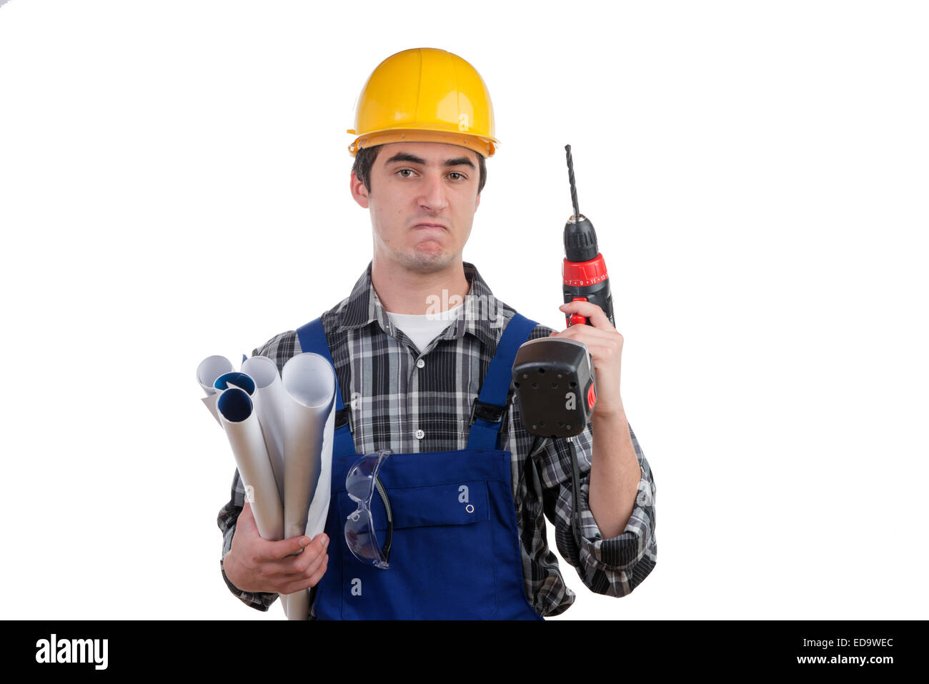 young worker with a drill is angry on the white background Stock Photo ...