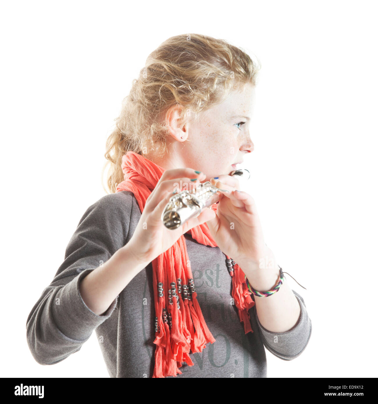 Young Woman Playing Flute Stock Photos & Young Woman Playing Flute ...