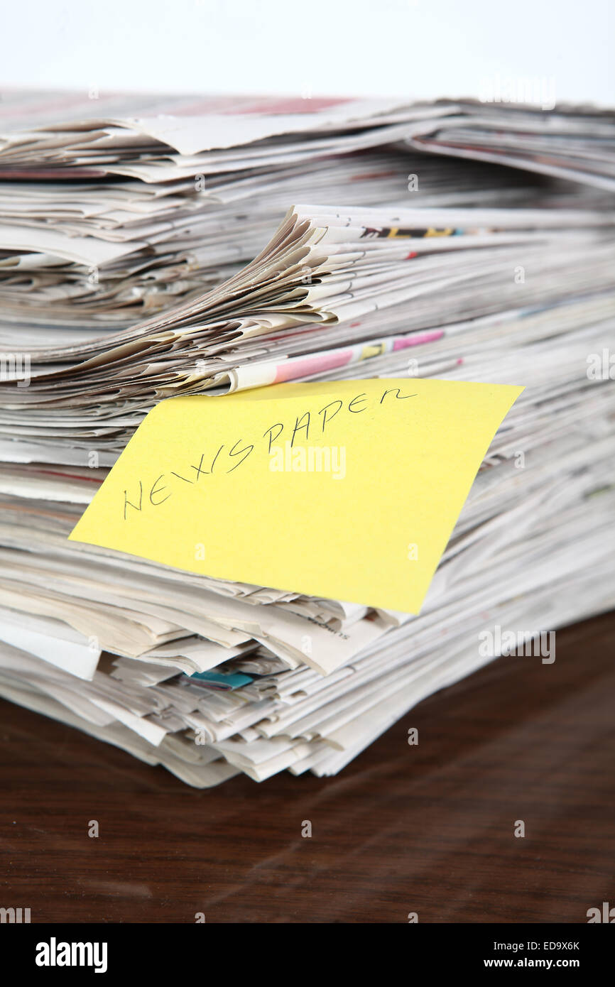 Stack stacked pile old newspaper newspapers hi-res stock photography ...