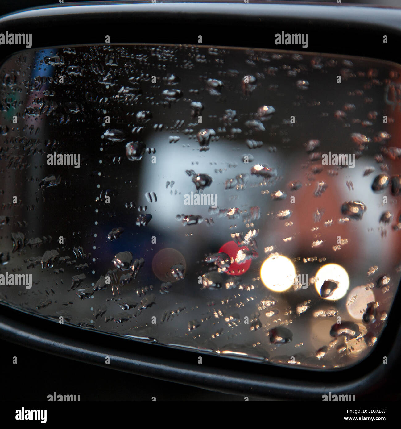 raindrops and reflections in rear view mirror Stock Photo - Alamy