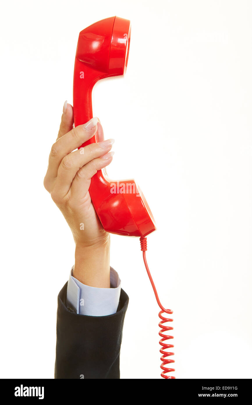 Hand holding landline phone hi-res stock photography and images - Alamy